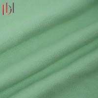 China 100% Cotton Fabric Green French Sheepskin Premium Cotton Material Winter Spring Sportswear Cotton Hoodie Fabric for sale