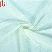 China 88% Polyester 12% Spandex Fabric , White Black Ice Silk Petal Jacquard Clothing Fabric for sale