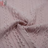 China Winter Pink Garment Soft Sweater Braid Cap Jacquard Knitted Textile Fabric for sale