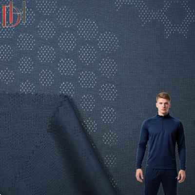 China Shirt Anti UV Quick Dry Sporty Jacquard Fabric 100% Polyester Knitted Fabric for sale