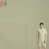 China 65% Polyester 35% Cotton 250gsm Polo Shirt Fabric Organic Cotton Waffle Fabric Combed Yarn for sale