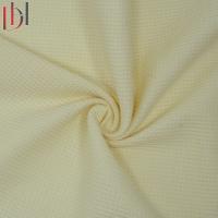 China 65% Polyester 35% Cotton 250gsm Polo Shirt Fabric Organic Cotton Waffle Fabric Combed Yarn for sale