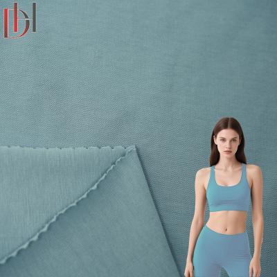 China 47.5% Lycell 47.5% Cotton 5% Spandex Knitted Tricot Sports Fabric Factory for sale