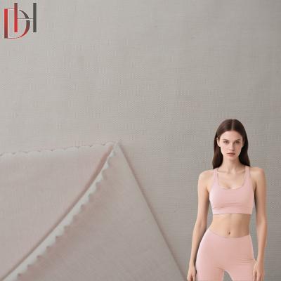 China Customized pink High Elasticity Yoga Sports Activewear Wicking Tricot ODM Fabric Factory for sale