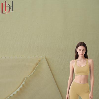 China Customized Organic Knitted Tricot Medium Weight Garment Soft Lyocell Cotton Stretch Yoga Sports Fabric for sale
