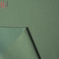 China Stretch Knit Fabric in Stock Fast Delivery Wholesale Ribbed Jersey Fabric Cotton Blend for Outerwear Jackets Coats for sale