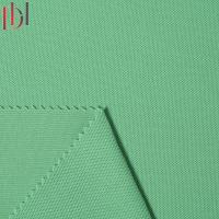 China Good Elasticity Cotton Blended Pique Knit Fabric Wholesale Apparel Raw Material for sale