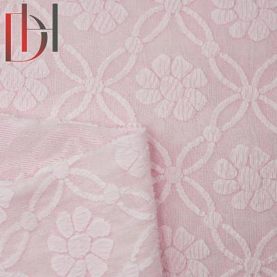 China Hot Sale Wrinkle Resistant Floral Jacquard Knit Fabric Easy Care For Fashion Skirts And Blouses for sale