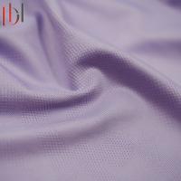 China Uniform Color Polyester Jacquard Mesh Knitted Fabric For Large Sport Event Garments for sale