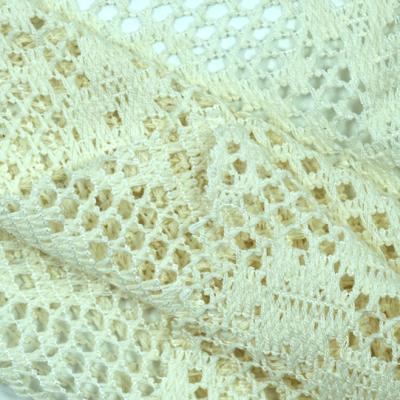 China Soft Lightweight Airy Jacquard Hollow Mesh Knitted Fabric For Fashion Garment Summer Women Apparel for sale
