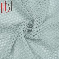 China Soft Semi Sheer Diamond Jacquard Mesh Fabric For Women Fashion Layer for sale
