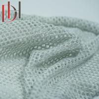 China 160cm 125gsm Lightweight 100% Polyester Diamond Mesh Jacquard Knitted Fabric For Ladies Fashion Apparel for sale