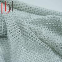 China 160cm 125gsm Lightweight 100% Polyester Diamond Mesh Jacquard Knitted Fabric For Ladies Fashion Apparel for sale