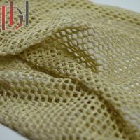China 125gsm Lightweight 100% Polyester Open Diamond Mesh Jacquard Knit Fabric For Summer Fashion Apparel for sale