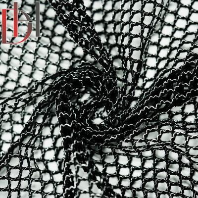 China 156gsm 100% Polyester Jacquard Mesh Fabric Textured Material For Fashion Hollow Overshirts for sale