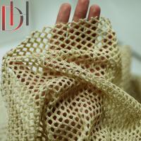 China 125gsm Lightweight 100% Polyester Open Diamond Mesh Jacquard Knit Fabric For Summer Fashion Apparel for sale