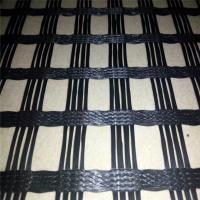 China 12.7*12.7mm Warp Knitted Polyester Geogrid Reinforced Composite Fiberglass Geogrid for sale