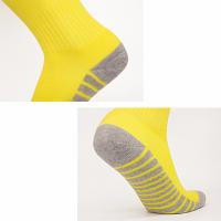 China Crew Length Soccer Anti Slip Socks Cotton Polyester No Slip Athletic Socks for sale