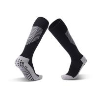 China Costomizabale Soccer Non Slip Socks Cotton Premium Fabric Sticky Football Socks for sale