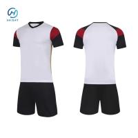 China Custom Team Jersey Dynamic Soccer Kits with Bold Stripes and Moisture-Wicking Design for sale