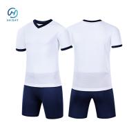 China Custom Team Jersey Dynamic Soccer Kits with Bold Stripes Fade-Resistant Ink for sale