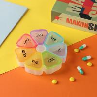 China 7 Day Weekly Pill Medicine Dispenser Box Flower Shape 7 Cases Vitamin Fish Oil 12cm for sale