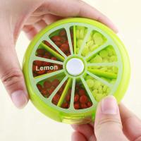 China Small weekly medicine dispenser mini kid pill box  7 cases  round tablet case for children or adult for sale
