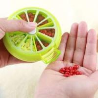 China Small weekly medicine dispenser mini kid pill box  7 cases  round tablet case for children or adult for sale