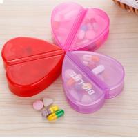China Can rotation Cute Heart shape pill box with four compartments  and can changed it with oval shape  pill holder for sale