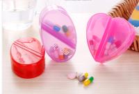 China Can rotation Cute Heart shape pill box with four compartments  and can changed it with oval shape  pill holder for sale