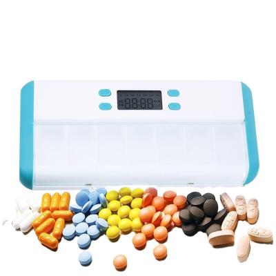China electronic dispenser ma cb pill case timer Automatic Pill Dispenser with LED Electronic Timing Reminder and Smart Vibrating for sale