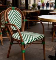 China Stackable Curved-Back Synthetic Wicker & Bamboo Commercial Outdoor Green Chair for sale