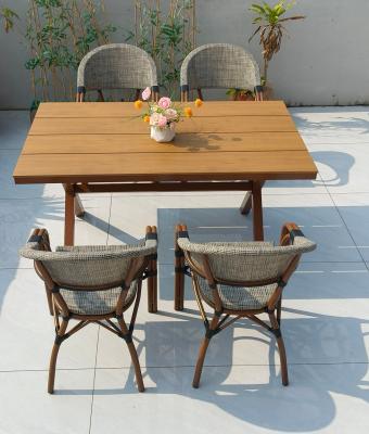 China 6 Seater Sturdy Aluminum Frame Oval Rattan Dining Table Outdoor for Hotel Resort Courtyard for sale