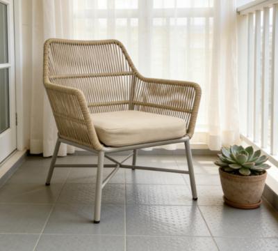 China Modern Handwoven Rope Lounge Chair with Matching Cushion Set Black Frame for Hotel Resort Villa for sale