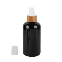 China Round Shoulder Cosmetic Spray Bottle Natural Bamboo PET Perfume Spray Bottle Black for sale