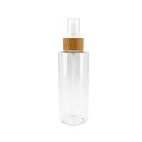 China Portable Cosmetic Spray Bottle Transparent Perfume Sprayer Bottle 100ml With Plastic And Bamboo Lid for sale