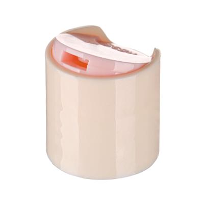 China Off White Disc Top Cap PP Plastic 24/410 Disc Cap For Cosmetic Packaging for sale