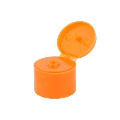 China Orange Flip Top Bottle Lids Customizable 24/410 Flip Cap For Cosmetics Sunscreen And Shampoo for sale