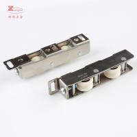 China Iron Frame Copper Plating Aluminum Profile Double Door Rollers with U Groove and POM 40mm for sale