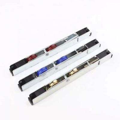 China 18mm Height Iron Frame Nylon Bearing UPVC Sliding Door Window Strip Pulley 12-15mm for sale
