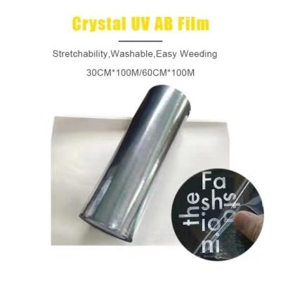 China Gold Silver UV DTF Transfer Film White Transparent Ab Pet Film  For Mobile Phone Cases for sale