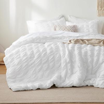 China Polyester Seersucker Comforter Set 120gsm Face 280gsm Fill Single Needle Quilt Knife Edge for sale