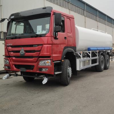 China Tank Water Spraying Truck 25000L Storage 14000Kg Sinotruk Howo 6 X 4 for sale