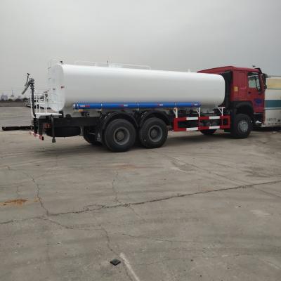 China Tank Water Spraying Truck 25000L Storage 14000Kg Sinotruk Howo 6 X 4 for sale