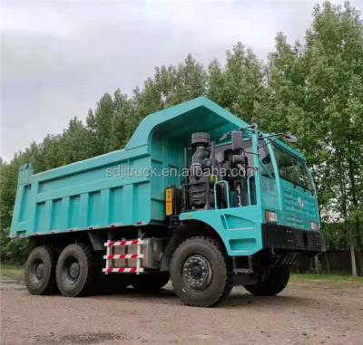 China 10 Wheels Mine Dump Truck High Power Sinotruk 90 Ton Half Cabin for sale