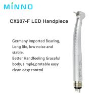 China 300000rpm Coxo High Speed Handpiece 4 Hole LED Dental Handpiece With 3 Way Spray for sale
