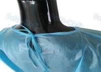China Blue Waterproof Disposable Isolation Gowns Ties On Neck Elastic Cuff for sale