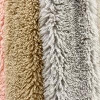 China Versatile 100% Polyester Artificial Long Curly Fur Fabric for Garments in Any Color for sale