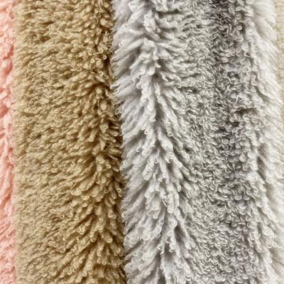 China Versatile 100% Polyester Artificial Long Curly Fur Fabric for Garments in Any Color for sale