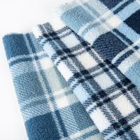 China Super Soft 100 Polyester Knitted Custom Pattern 3D Jacquard Mirco Sherpa Fleece Fabric for Garment for sale